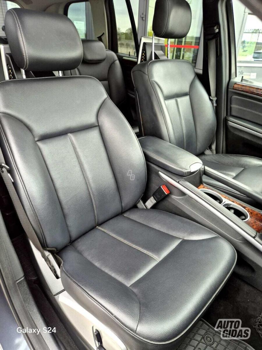 Grey Mercedes-Benz GL 450 2010 in Siauliai, with an engine capacity of 4.70 L and mileage of 310 thousand km for 6800 €, photo 16 on AUTOMOTO.COM.LV