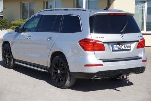 Pelēks Mercedes-Benz GL 450 2015 Kvietiniai, ar dzinēja tilpumu 3.00 L un nobraukumu 181 tūkst. km par 17500 €, foto 5 vietnē AUTOMOTO.COM.LV