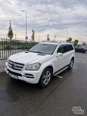 Белый Мерседес ГЛ 450 2011 в Шяуляй, объемом двигателя 4.70 л и пробегом 410 тыс. км за 4700 €, фото  на AUTOMOTO.COM.LV