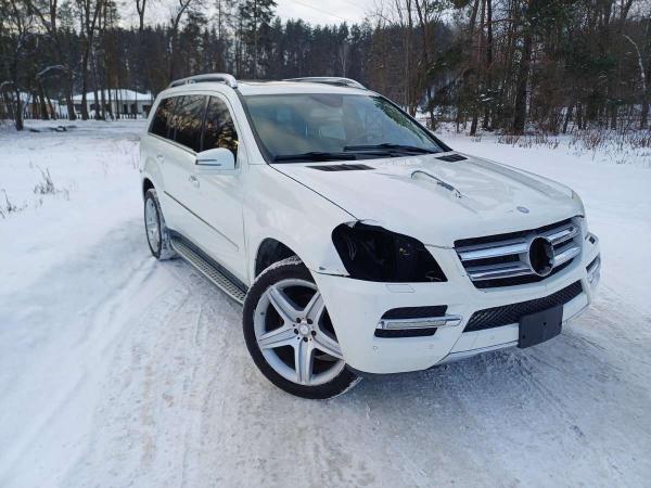 White Mercedes-Benz GL 450 2012 in Vilnius, with an engine capacity of 0.00 L and mileage of 248 thousand km for 6650 €, photo 8 on AUTOMOTO.COM.LV