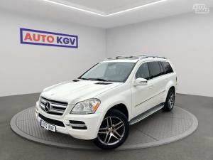 White Mercedes-Benz GL 450 2012 in Kaunas, with an engine capacity of 4.70 L and mileage of 198 thousand km for 11996 €, photo  on AUTOMOTO.COM.LV