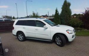 White Mercedes-Benz GL 450 2012 in Kaunas, with an engine capacity of 4.66 L and mileage of 221 thousand km for 11100 €, photo  on AUTOMOTO.COM.LV