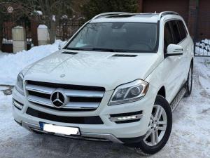 White Mercedes-Benz GL 450 2013 in Klaipeda, with an engine capacity of 4.66 L and mileage of 140 thousand km for 15700 €, photo 4 on AUTOMOTO.COM.LV