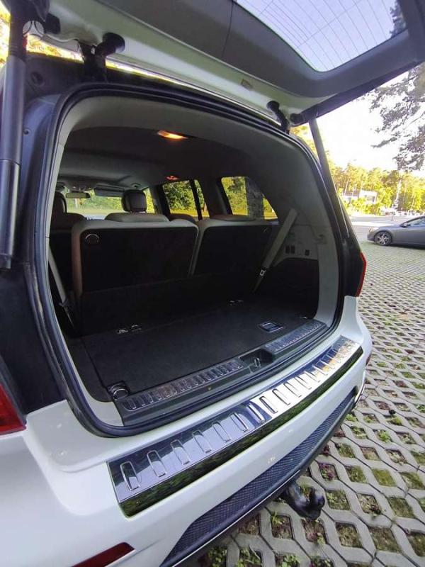 White Mercedes-Benz GL 450 2013 in Vilnius, with an engine capacity of 4.66 L and mileage of 258 thousand km for 14000 €, photo 8 on AUTOMOTO.COM.LV