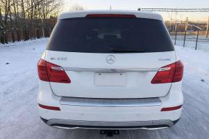 White Mercedes-Benz GL 450 2014 in Siauliai, with an engine capacity of 4.70 L and mileage of 303 thousand km for 12300 €, photo 5 on AUTOMOTO.COM.LV