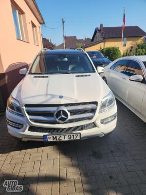 White Mercedes-Benz GL 450 2014 in Taurage, with an engine capacity of 4.60 L and mileage of 208 thousand km for 18800 €, photo  on AUTOMOTO.COM.LV