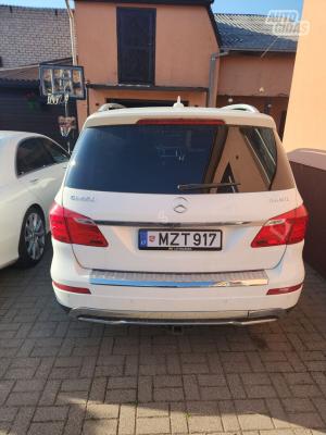 White Mercedes-Benz GL 450 2014 in Taurage, with an engine capacity of 4.60 L and mileage of 208 thousand km for 18800 €, photo 5 on AUTOMOTO.COM.LV