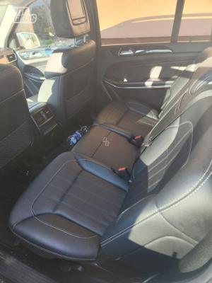 White Mercedes-Benz GL 450 2014 in Taurage, with an engine capacity of 4.60 L and mileage of 208 thousand km for 18800 €, photo 8 on AUTOMOTO.COM.LV