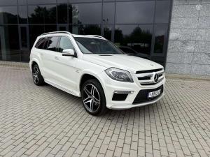 White Mercedes-Benz GL 450 2014 in Klaipeda, with an engine capacity of 4.66 L and mileage of 230 thousand km for 13900 €, photo  on AUTOMOTO.COM.LV