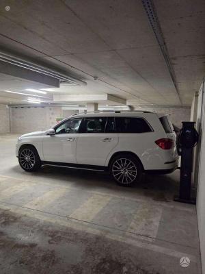 White Mercedes-Benz GL 450 2014 in Vilnius, with an engine capacity of 4.66 L and mileage of 215 thousand km for 13899 €, photo  on AUTOMOTO.COM.LV