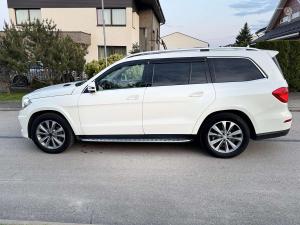 White Mercedes-Benz GL 450 2014 in Vilnius, with an engine capacity of 4.50 L and mileage of 211 thousand km for 14999 €, photo 4 on AUTOMOTO.COM.LV