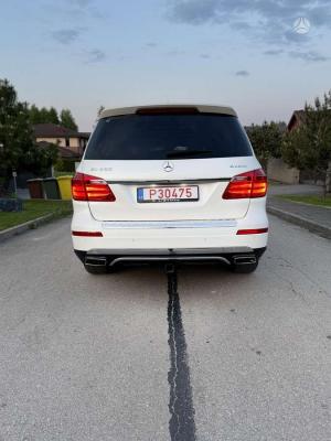 White Mercedes-Benz GL 450 2014 in Vilnius, with an engine capacity of 4.50 L and mileage of 211 thousand km for 14999 €, photo 5 on AUTOMOTO.COM.LV