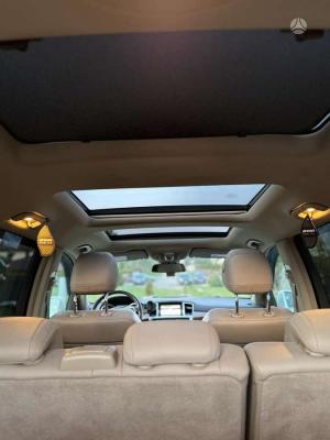 White Mercedes-Benz GL 450 2014 in Vilnius, with an engine capacity of 4.50 L and mileage of 211 thousand km for 14999 €, photo 12 on AUTOMOTO.COM.LV