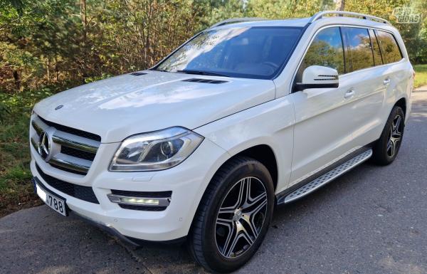 White Mercedes-Benz GL 450 2015 in Kaunas, with an engine capacity of 3.00 L and mileage of 184 thousand km for 17700 €, photo 1 on AUTOMOTO.COM.LV