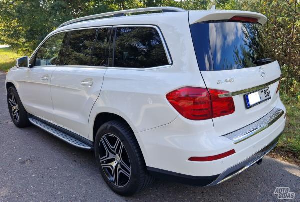 White Mercedes-Benz GL 450 2015 in Kaunas, with an engine capacity of 3.00 L and mileage of 184 thousand km for 17700 €, photo 4 on AUTOMOTO.COM.LV