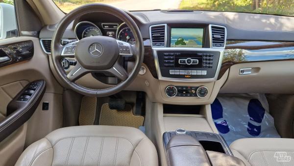 White Mercedes-Benz GL 450 2015 in Kaunas, with an engine capacity of 3.00 L and mileage of 184 thousand km for 17700 €, photo 5 on AUTOMOTO.COM.LV