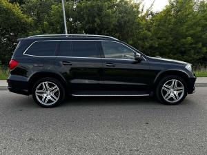 Black Mercedes-Benz gl-500 2015 in Vilnius, with an engine capacity of 4.66 L and mileage of 182 thousand km for 21999 €, photo 4 on AUTOMOTO.COM.LV