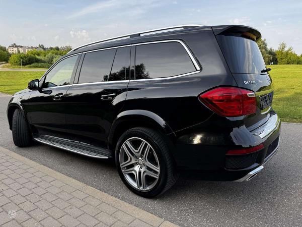 Black Mercedes-Benz gl-500 2015 in Vilnius, with an engine capacity of 4.66 L and mileage of 182 thousand km for 21999 €, photo 8 on AUTOMOTO.COM.LV