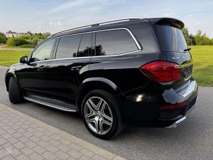 Black Mercedes-Benz gl-500 2015 in Vilnius, with an engine capacity of 4.66 L and mileage of 182 thousand km for 21999 €, photo 9 on AUTOMOTO.COM.LV