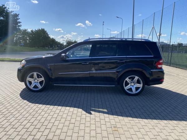 Black Mercedes-Benz gl-550 2011 in Jonava, with an engine capacity of 5.50 L and mileage of 386 thousand km for 8500 €, photo 1 on AUTOMOTO.COM.LV