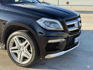 Black Mercedes-Benz gl-550 2013 in Vilnius, with an engine capacity of 4.70 L and mileage of 240 thousand km for 17500 €, photo 9 on AUTOMOTO.COM.LV