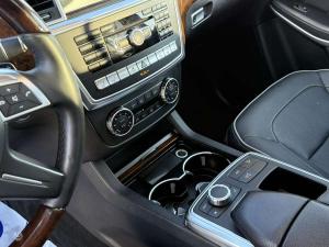 Black Mercedes-Benz gl-550 2013 in Vilnius, with an engine capacity of 4.70 L and mileage of 240 thousand km for 17500 €, photo 26 on AUTOMOTO.COM.LV
