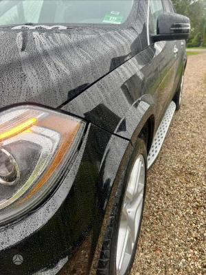 Black Mercedes-Benz gl-550 2013 in Plunge, with an engine capacity of 4.66 L and mileage of 202 thousand km for 12990 €, photo 8 on AUTOMOTO.COM.LV