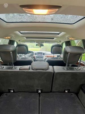 Black Mercedes-Benz gl-550 2013 in Plunge, with an engine capacity of 4.66 L and mileage of 202 thousand km for 12990 €, photo 12 on AUTOMOTO.COM.LV