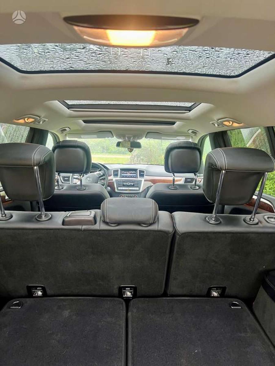Black Mercedes-Benz gl-550 2013 in Plunge, with an engine capacity of 4.66 L and mileage of 202 thousand km for 12990 €, photo 12 on AUTOMOTO.COM.LV