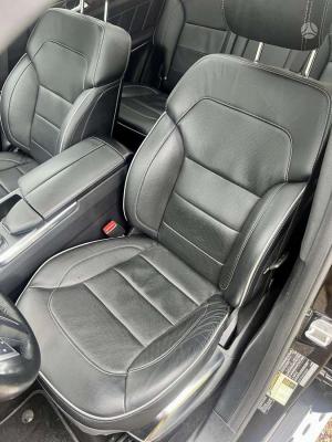 Black Mercedes-Benz gl-550 2013 in Plunge, with an engine capacity of 4.66 L and mileage of 202 thousand km for 12990 €, photo 15 on AUTOMOTO.COM.LV