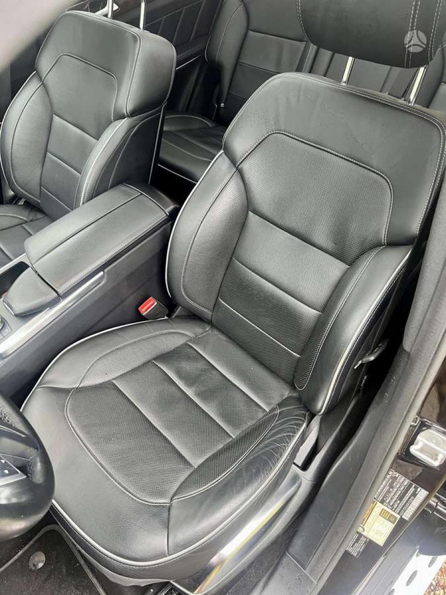 Black Mercedes-Benz gl-550 2013 in Plunge, with an engine capacity of 4.66 L and mileage of 202 thousand km for 12990 €, photo 15 on AUTOMOTO.COM.LV
