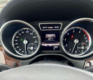 Black Mercedes-Benz gl-550 2013 in Plunge, with an engine capacity of 4.66 L and mileage of 202 thousand km for 12990 €, photo 18 on AUTOMOTO.COM.LV