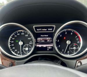 Black Mercedes-Benz gl-550 2013 in Plunge, with an engine capacity of 4.66 L and mileage of 202 thousand km for 12990 €, photo 19 on AUTOMOTO.COM.LV