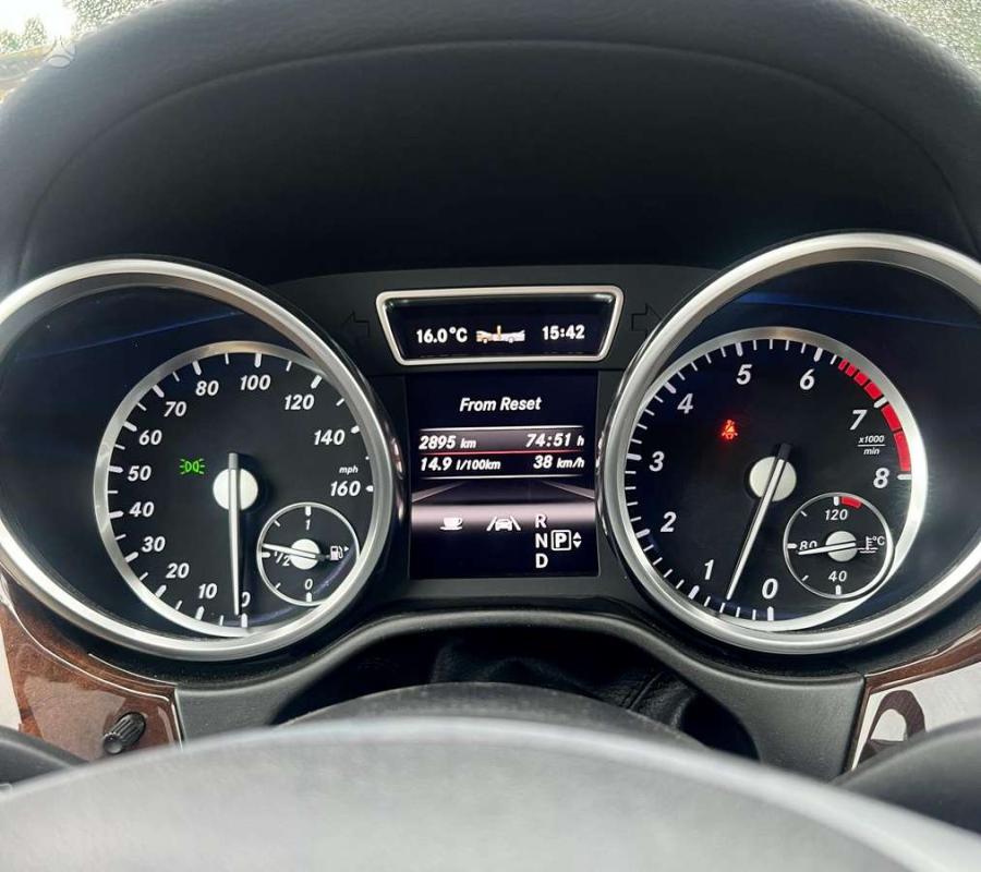 Black Mercedes-Benz gl-550 2013 in Plunge, with an engine capacity of 4.66 L and mileage of 202 thousand km for 12990 €, photo 19 on AUTOMOTO.COM.LV