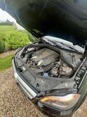 Black Mercedes-Benz gl-550 2013 in Plunge, with an engine capacity of 4.66 L and mileage of 202 thousand km for 12990 €, photo 20 on AUTOMOTO.COM.LV