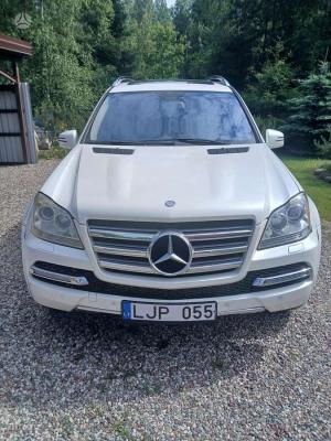 White Mercedes-Benz gl-550 2011 in Klaipeda, with an engine capacity of 5.46 L and mileage of 300 thousand km for 10500 €, photo  on AUTOMOTO.COM.LV