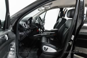Black Mercedes-Benz GL-Class 2011 in Tallinn, with an engine capacity of 4.00 L and mileage of 272 thousand km for 16990 €, photo 13 on AUTOMOTO.COM.LV