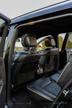 Black Mercedes-Benz GL-Class 2014 in Tallinn, with an engine capacity of 3.00 L and mileage of 257 thousand km for 25000 €, photo 14 on AUTOMOTO.COM.LV