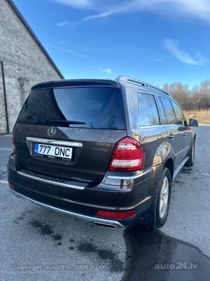 Brown Mercedes-Benz GL-Class 2011 in Tallinn, with an engine capacity of 3.00 L and mileage of 239 thousand km for 15999 €, photo 6 on AUTOMOTO.COM.LV