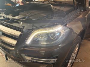 Brūns Mercedes-Benz GL-Class 2016 Tallina, ar dzinēja tilpumu 3.00 L un nobraukumu 290 tūkst. km par 21999 €, foto 25 vietnē AUTOMOTO.COM.LV