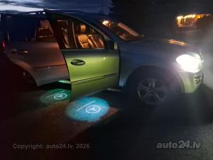 Pelēks Mercedes-Benz GL-Class 2009 Tallina, ar dzinēja tilpumu 4.00 L un nobraukumu 390 tūkst. km par 5999 €, foto 19 vietnē AUTOMOTO.COM.LV