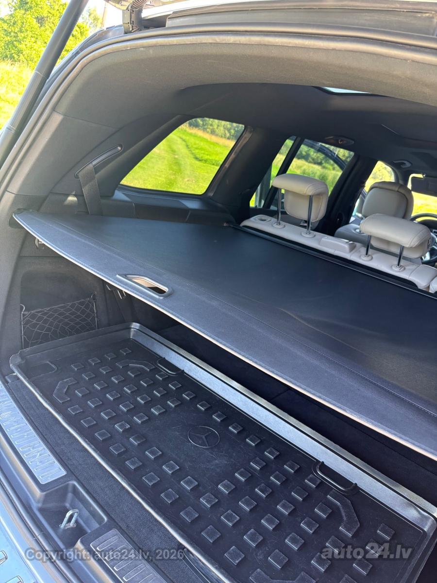 Grey Mercedes-Benz GL-Class 2013 in Tallinn, with an engine capacity of 3.00 L and mileage of 225 thousand km for 17000 €, photo 13 on AUTOMOTO.COM.LV