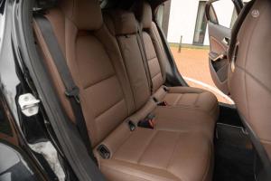 Black Mercedes-Benz GLA 250 2014 in Vilnius, with an engine capacity of 1.99 L and mileage of 98 thousand km for 12990 €, photo 17 on AUTOMOTO.COM.LV