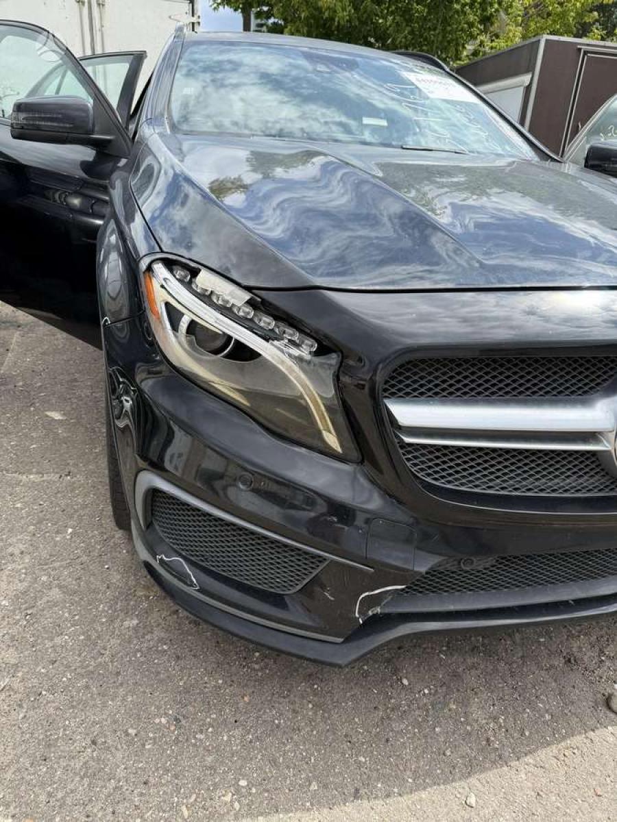 Black Mercedes-Benz gla-45-amg 2014 in Vilnius, with an engine capacity of 2.00 L and mileage of 387 thousand km for 9900 €, photo 8 on AUTOMOTO.COM.LV