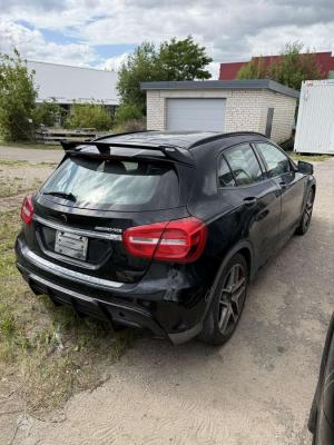 Black Mercedes-Benz gla-45-amg 2014 in Vilnius, with an engine capacity of 2.00 L and mileage of 387 thousand km for 9900 €, photo 9 on AUTOMOTO.COM.LV