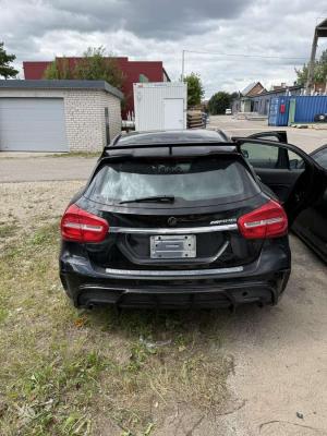 Black Mercedes-Benz gla-45-amg 2014 in Vilnius, with an engine capacity of 2.00 L and mileage of 387 thousand km for 9900 €, photo 12 on AUTOMOTO.COM.LV