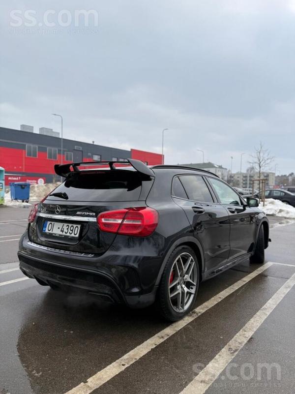 Black Mercedes-Benz gla-45-amg 2015 in Riga, with an engine capacity of 2.00 L and mileage of 208 thousand km for 23000 €, photo 5 on AUTOMOTO.COM.LV