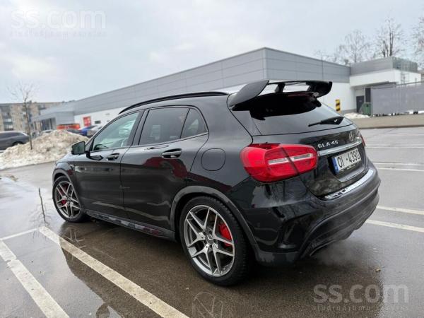 Black Mercedes-Benz gla-45-amg 2015 in Riga, with an engine capacity of 2.00 L and mileage of 208 thousand km for 23000 €, photo 6 on AUTOMOTO.COM.LV