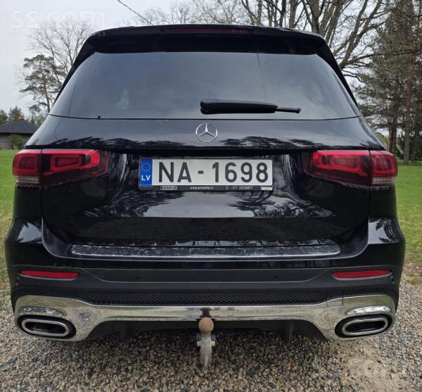 Black Mercedes-Benz GLB 200 2021 in Riga, with an engine capacity of 2.00 L and mileage of 132 thousand km for 25000 €, photo 4 on AUTOMOTO.COM.LV