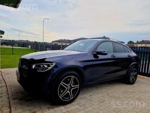 Blue Mercedes-Benz GLC 200 2023 in Riga, with an engine capacity of 2.00 L and mileage of 80 thousand km for 41000 €, photo  on AUTOMOTO.COM.LV